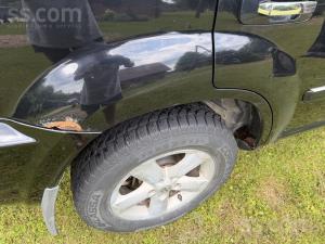 Black Nissan X-Trail 2006 in Riga, with an engine capacity of 2.20 L and mileage of 294 thousand km for 1650 €, photo 7 on AUTOMOTO.COM.LV