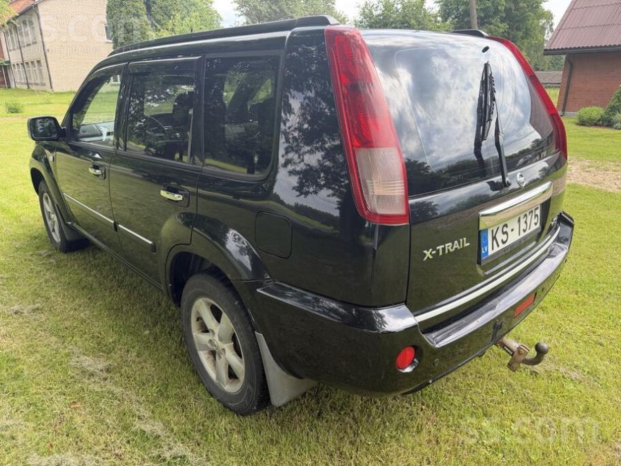 Black Nissan X-Trail 2006 in Riga, with an engine capacity of 2.20 L and mileage of 294 thousand km for 1650 €, photo 11 on AUTOMOTO.COM.LV