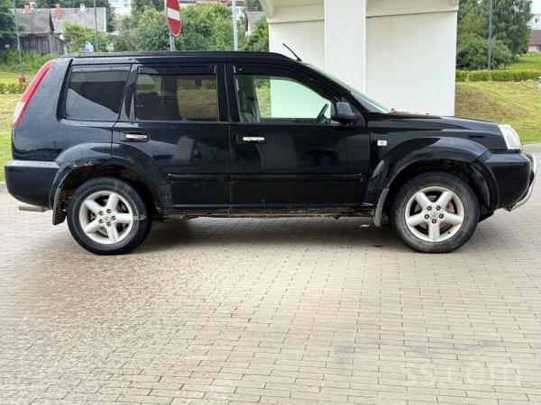 Melns Nissan X-Trail 2006 Rēzekne, ar dzinēja tilpumu 2.20 L un nobraukumu 366 tūkst. km par 1400 €, foto 7 vietnē AUTOMOTO.COM.LV