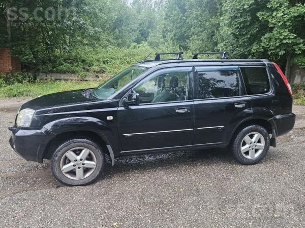 Black Nissan X-Trail 2006 in Liepaja, with an engine capacity of 2.20 L and mileage of 267 thousand km for 1700 €, photo 7 on AUTOMOTO.COM.LV