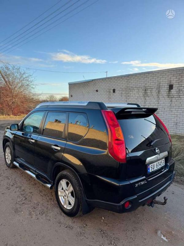 Black Nissan X-Trail 2007 in Kaunas, with an engine capacity of 2.00 L and mileage of 260 thousand km for 4300 €, photo 6 on AUTOMOTO.COM.LV