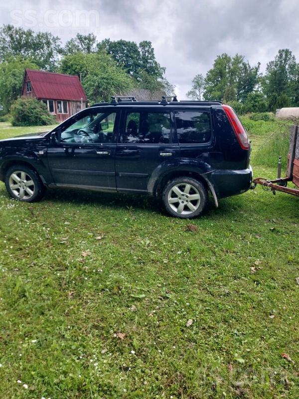Melns Nissan X-Trail 2007 Ogre, ar dzinēja tilpumu 2.20 L un nobraukumu 325 tūkst. km par 1250 €, foto 1 vietnē AUTOMOTO.COM.LV