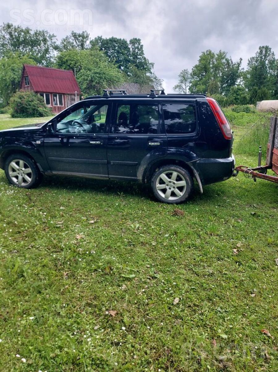 Melns Nissan X-Trail 2007 Ogre, ar dzinēja tilpumu 2.20 L un nobraukumu 325 tūkst. km par 1250 €, foto 1 vietnē AUTOMOTO.COM.LV