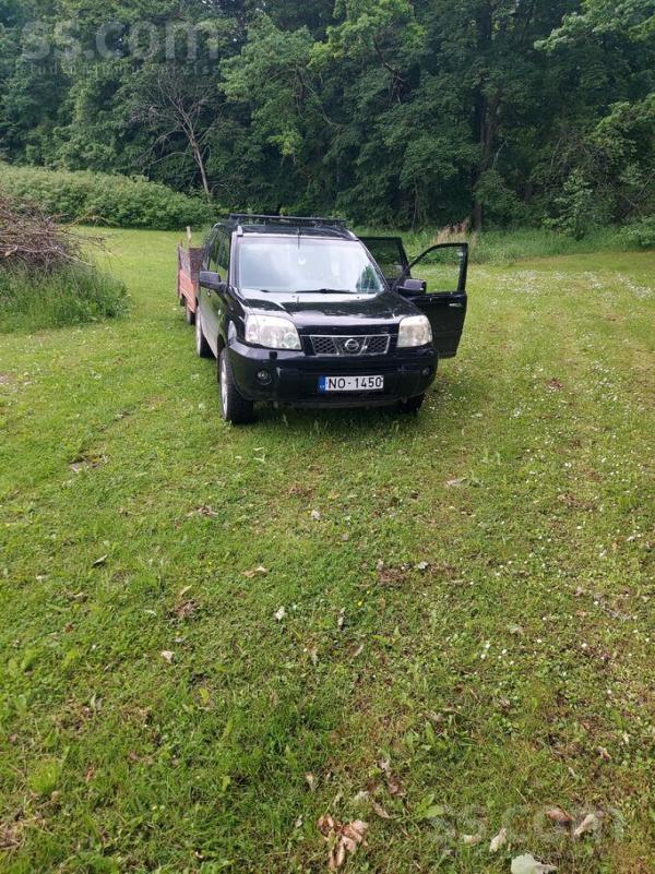 Melns Nissan X-Trail 2007 Ogre, ar dzinēja tilpumu 2.20 L un nobraukumu 325 tūkst. km par 1250 €, foto 3 vietnē AUTOMOTO.COM.LV