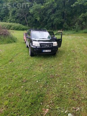 Melns Nissan X-Trail 2007 Ogre, ar dzinēja tilpumu 2.20 L un nobraukumu 325 tūkst. km par 1250 €, foto 4 vietnē AUTOMOTO.COM.LV