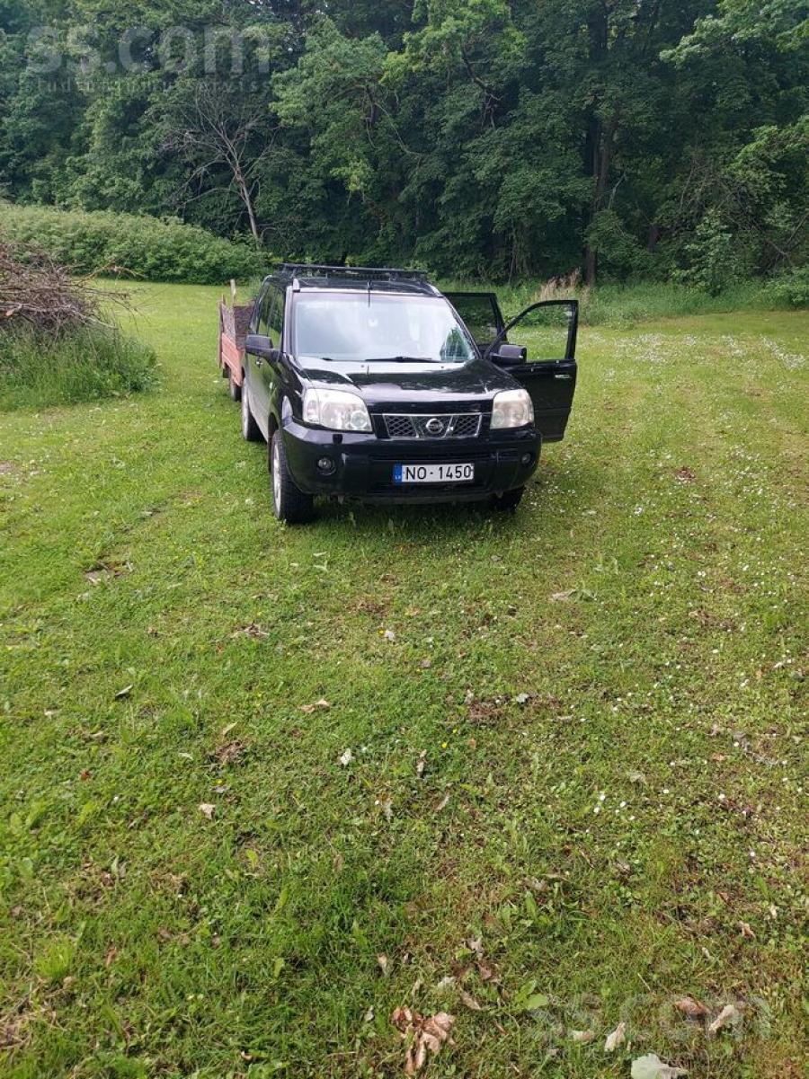 Melns Nissan X-Trail 2007 Ogre, ar dzinēja tilpumu 2.20 L un nobraukumu 325 tūkst. km par 1250 €, foto 4 vietnē AUTOMOTO.COM.LV