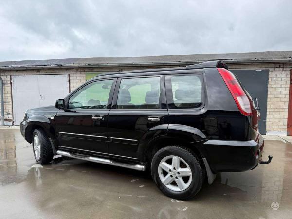 Black Nissan X-Trail 2007 in Kaunas, with an engine capacity of 2.18 L and mileage of 230 thousand km for 1850 €, photo 5 on AUTOMOTO.COM.LV