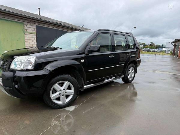 Black Nissan X-Trail 2007 in Kaunas, with an engine capacity of 2.18 L and mileage of 230 thousand km for 1850 €, photo 6 on AUTOMOTO.COM.LV