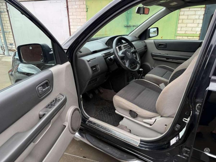 Black Nissan X-Trail 2007 in Kaunas, with an engine capacity of 2.18 L and mileage of 230 thousand km for 1850 €, photo 9 on AUTOMOTO.COM.LV