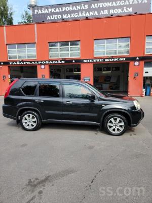 Black Nissan X-Trail 2009 in Riga, with an engine capacity of 2.00 L and mileage of 335 thousand km for 5250 €, photo 7 on AUTOMOTO.COM.LV