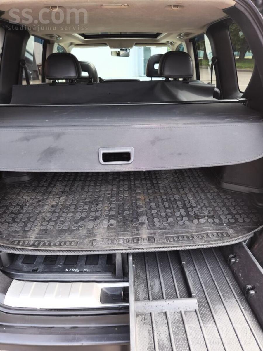 Black Nissan X-Trail 2009 in Riga, with an engine capacity of 2.00 L and mileage of 335 thousand km for 5250 €, photo 16 on AUTOMOTO.COM.LV