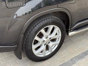 Black Nissan X-Trail 2012 in Riga, with an engine capacity of 2.00 L and mileage of 260 thousand km for 9400 €, photo 32 on AUTOMOTO.COM.LV