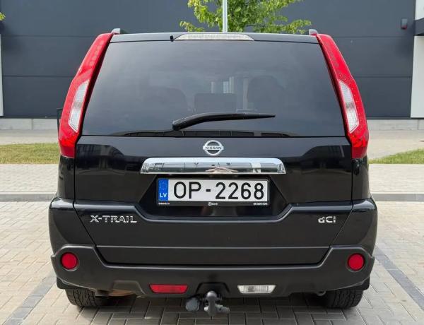 Black Nissan X-Trail 2012 in Riga, with an engine capacity of 2.00 L and mileage of 260 thousand km for 9400 €, photo 4 on AUTOMOTO.COM.LV
