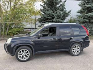 Black Nissan X-Trail 2012 in Marijampole, with an engine capacity of 2.00 L and mileage of 260 thousand km for 4950 €, photo 5 on AUTOMOTO.COM.LV