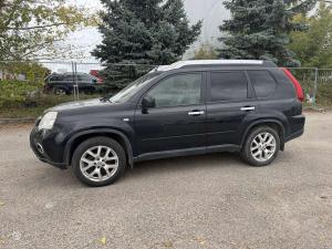 Black Nissan X-Trail 2012 in Marijampole, with an engine capacity of 2.00 L and mileage of 260 thousand km for 4650 €, photo 9 on AUTOMOTO.COM.LV