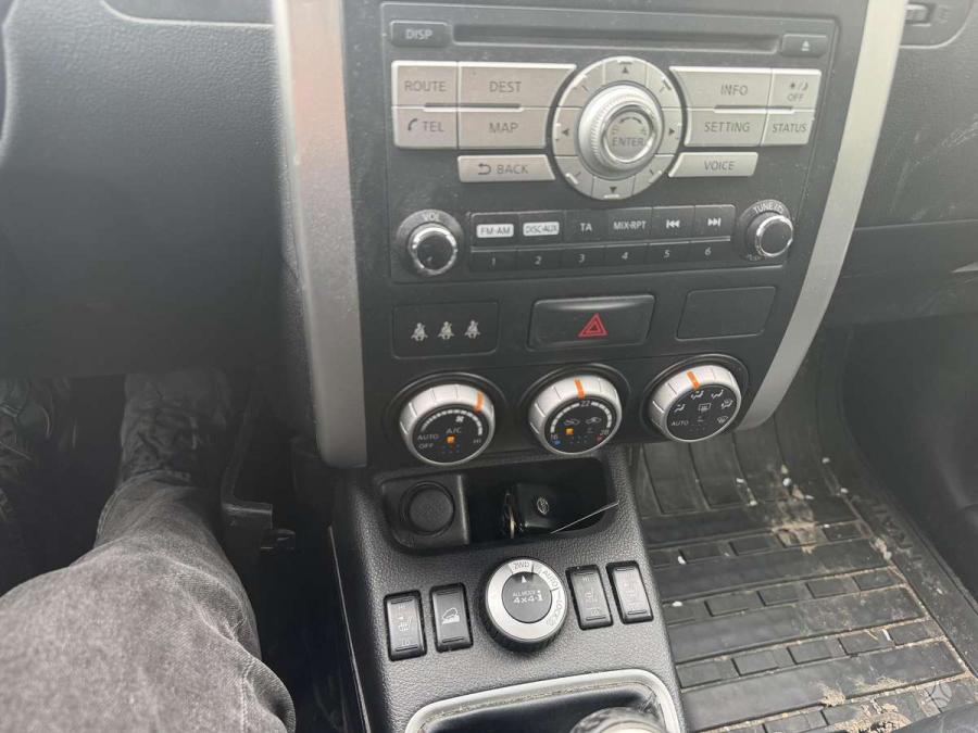 Black Nissan X-Trail 2012 in Marijampole, with an engine capacity of 2.00 L and mileage of 260 thousand km for 4650 €, photo 12 on AUTOMOTO.COM.LV