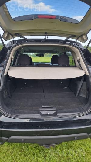 Black Nissan X-Trail 2016 in Ogre, with an engine capacity of 1.60 L and mileage of 245 thousand km for 7800 €, photo 9 on AUTOMOTO.COM.LV