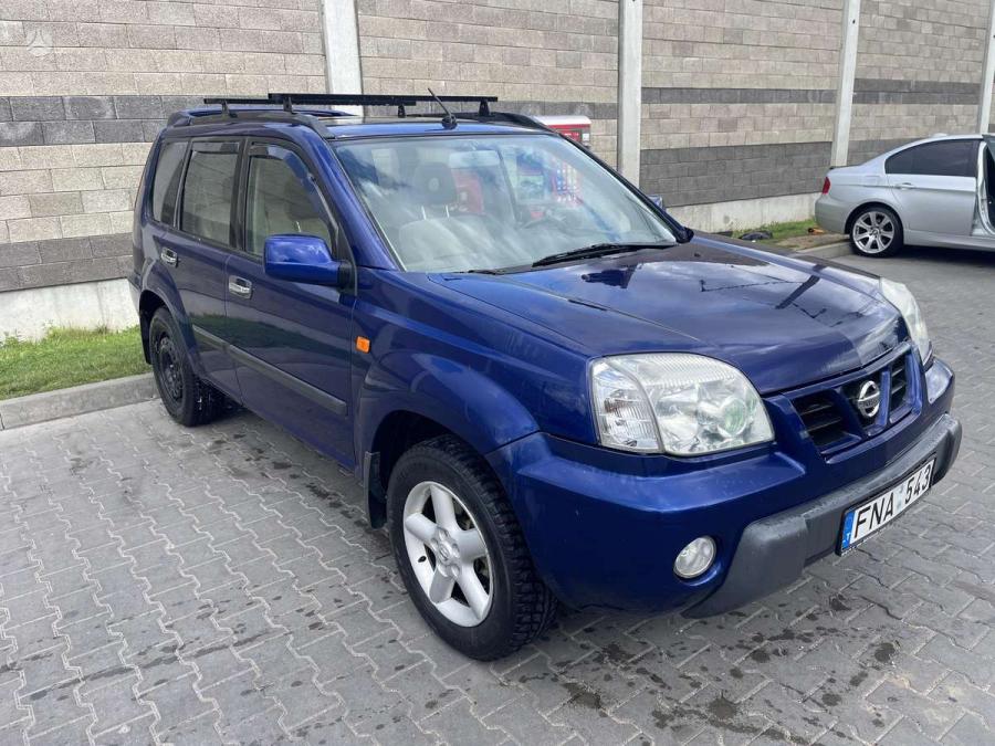 Blue Nissan X-Trail 2002 in Vilnius, with an engine capacity of 2.20 L and mileage of 333 thousand km for 1599 €, photo 4 on AUTOMOTO.COM.LV