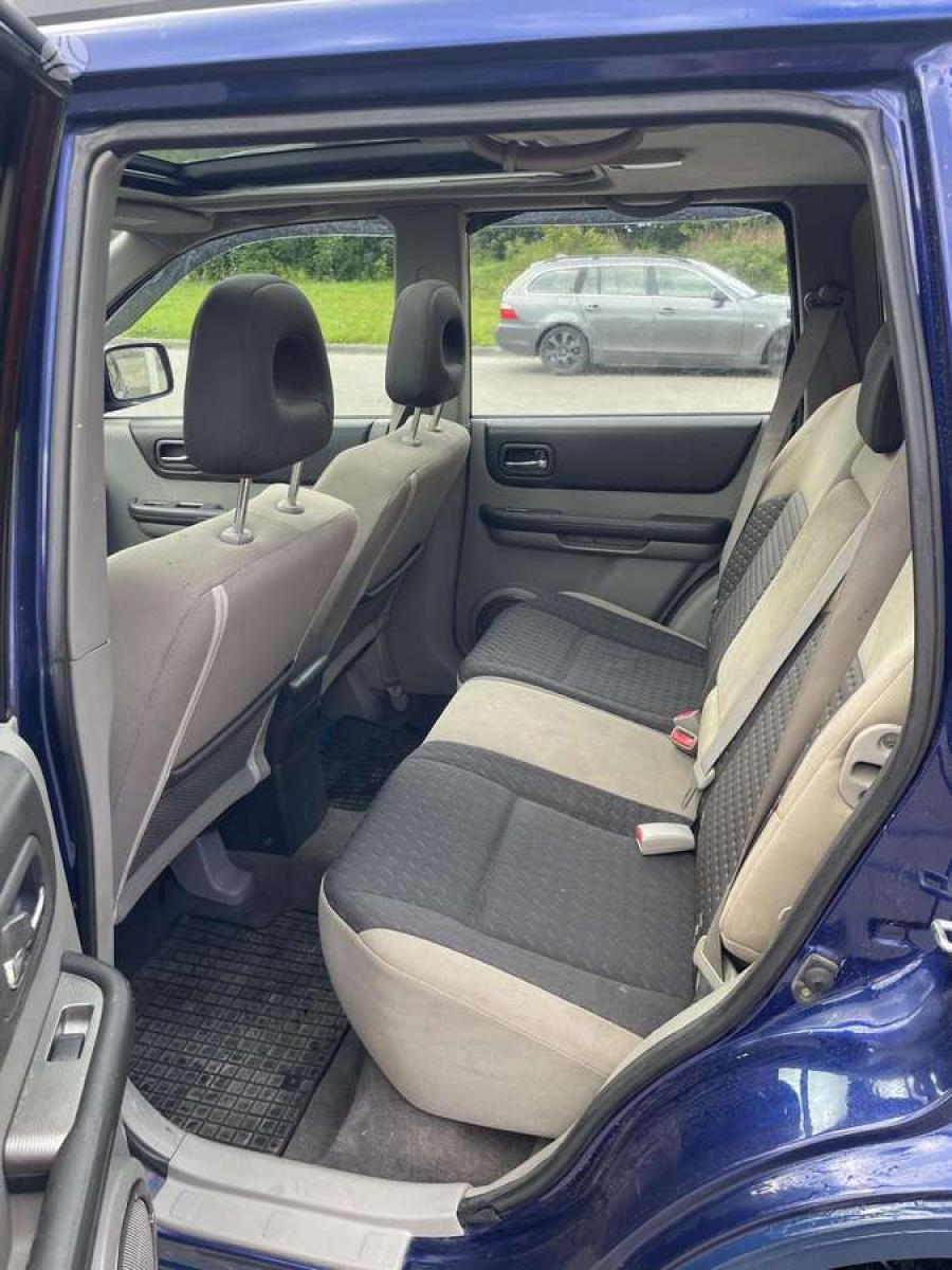 Blue Nissan X-Trail 2002 in Vilnius, with an engine capacity of 2.20 L and mileage of 333 thousand km for 1599 €, photo 12 on AUTOMOTO.COM.LV