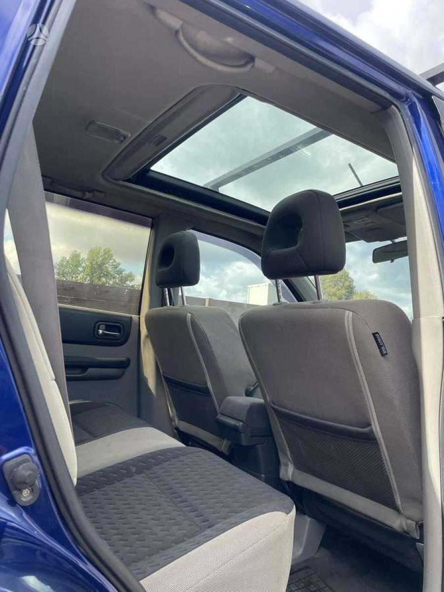 Blue Nissan X-Trail 2002 in Vilnius, with an engine capacity of 2.20 L and mileage of 333 thousand km for 1599 €, photo 14 on AUTOMOTO.COM.LV