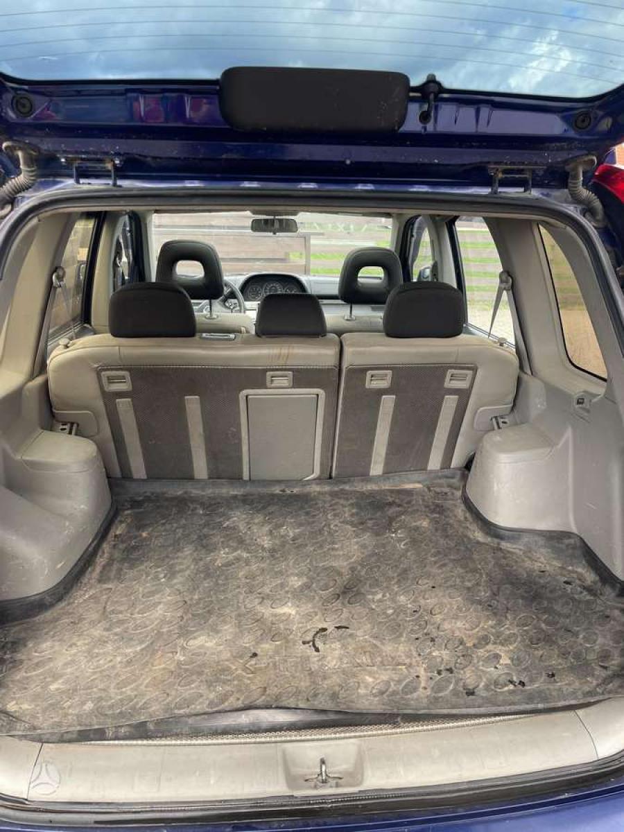Blue Nissan X-Trail 2002 in Vilnius, with an engine capacity of 2.20 L and mileage of 333 thousand km for 1599 €, photo 17 on AUTOMOTO.COM.LV