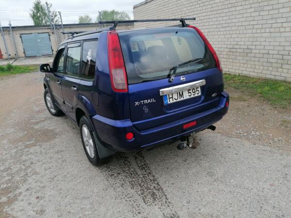 Blue Nissan X-Trail 2006 in Utena, with an engine capacity of 2.20 L and mileage of 311 thousand km for 1750 €, photo 9 on AUTOMOTO.COM.LV