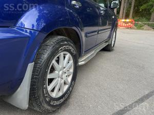 Zils Nissan X-Trail 2006 Rīga, ar dzinēja tilpumu 2.20 L un nobraukumu 394 tūkst. km par 2750 €, foto 12 vietnē AUTOMOTO.COM.LV