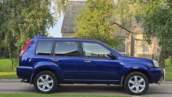 Blue Nissan X-Trail 2007 in Marijampole, with an engine capacity of 2.20 L and mileage of 299 thousand km for 2750 €, photo 8 on AUTOMOTO.COM.LV