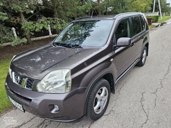 Nissan X-Trail 2008 in Mazeikiai on AUTOMOTO.COM.LV Brown Nissan X-Trail 2008 in Mazeikiai, with an engine capacity of 2.00 L and mileage of 189 thousand km for 4850 €, photo 4 on AUTOMOTO.COM.LV