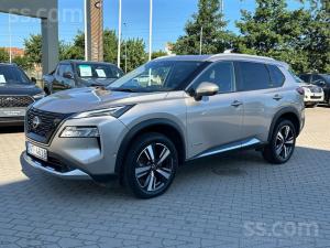 Brown Nissan X-Trail 2024 in Liepaja, with an engine capacity of 1.50 L and mileage of 81 thousand km for 31900 €, photo  on AUTOMOTO.COM.LV