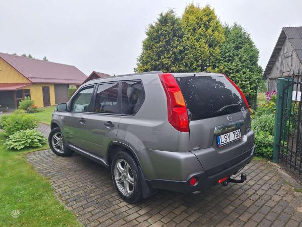 Brūns Nissan X-Trail 2009 Elektrėnai, ar dzinēja tilpumu 2.00 L un nobraukumu 198 tūkst. km par 4150 €, foto 1 vietnē AUTOMOTO.COM.LV