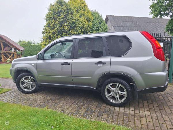 Brūns Nissan X-Trail 2009 Elektrėnai, ar dzinēja tilpumu 2.00 L un nobraukumu 198 tūkst. km par 4150 €, foto 7 vietnē AUTOMOTO.COM.LV