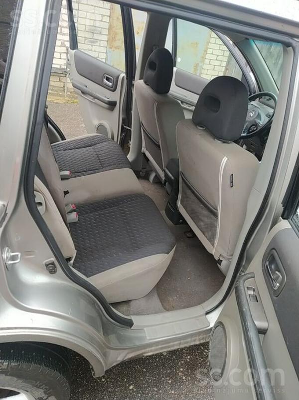Nissan X-Trail 2004 in Riga, with an engine capacity of 2.50 L and mileage of 243 thousand km for 860 €, photo 4 on AUTOMOTO.COM.LV