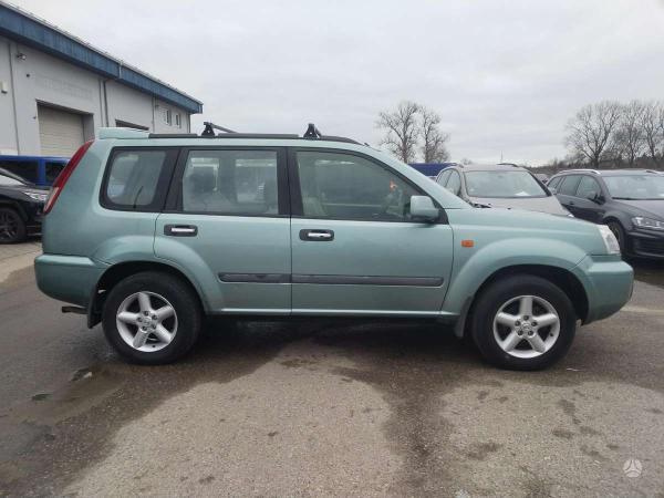 Green Nissan X-Trail 2003 in Marijampole, with an engine capacity of 2.18 L and mileage of 274 thousand km for 3199 €, photo 4 on AUTOMOTO.COM.LV