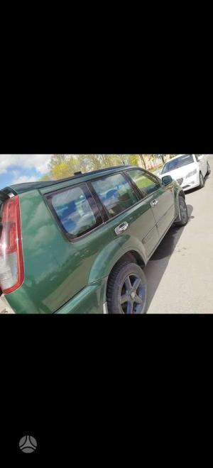 Green Nissan X-Trail 2003 in Maardu, with an engine capacity of 2.18 L and mileage of 259 thousand km for 1269 €, photo 3 on AUTOMOTO.COM.LV