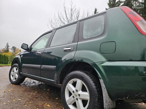 Nissan X-Trail 2007 in Kaunas on AUTOMOTO.COM.LV Green Nissan X-Trail 2007 in Kaunas, with an engine capacity of 2.20 L and mileage of 320 thousand km for 2300 €, photo 8 on AUTOMOTO.COM.LV