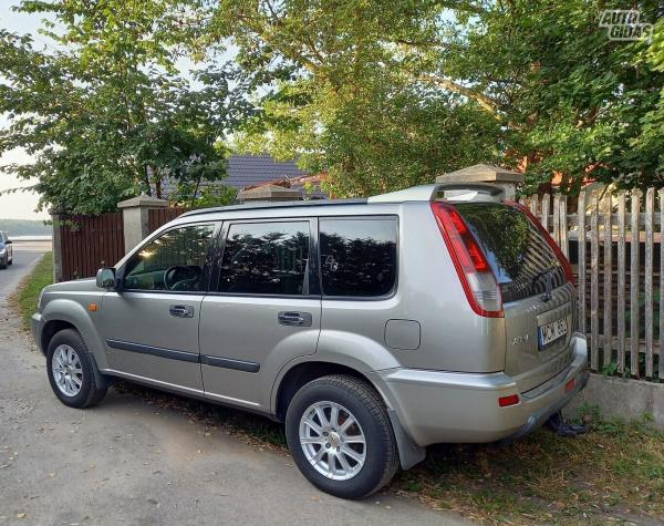 Grey Nissan X-Trail 2003 in Trakai, with an engine capacity of 2.20 L and mileage of 192 thousand km for 2600 €, photo 2 on AUTOMOTO.COM.LV