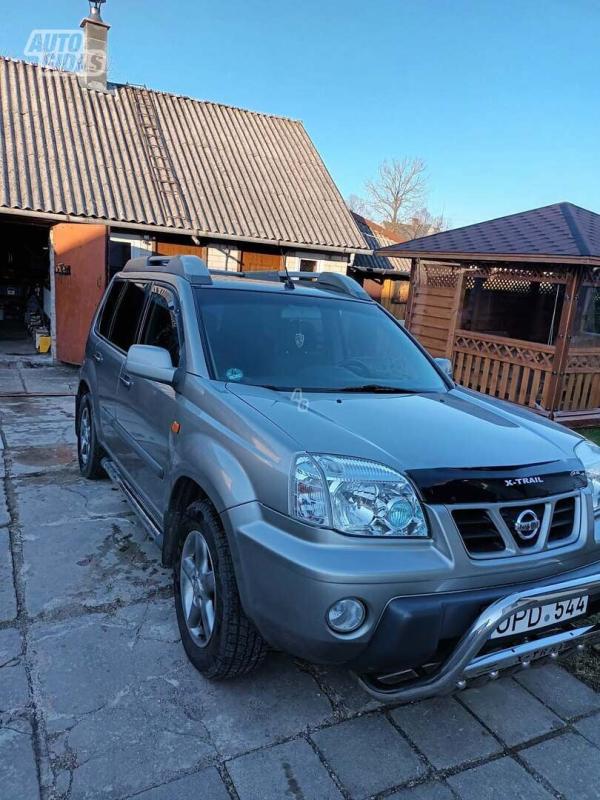Pelēks Nissan X-Trail 2003 Alīta, ar dzinēja tilpumu 2.20 L un nobraukumu 246 tūkst. km par 2000 €, foto 6 vietnē AUTOMOTO.COM.LV