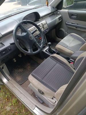 Grey Nissan X-Trail 2003 in Mazeikiai, with an engine capacity of 2.18 L and mileage of 335 thousand km for 600 €, photo 6 on AUTOMOTO.COM.LV