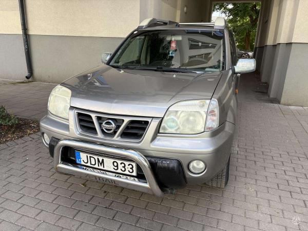 Pelēks Nissan X-Trail 2003 Viļņa, ar dzinēja tilpumu 2.20 L un nobraukumu 371 tūkst. km par 1800 €, foto 2 vietnē AUTOMOTO.COM.LV