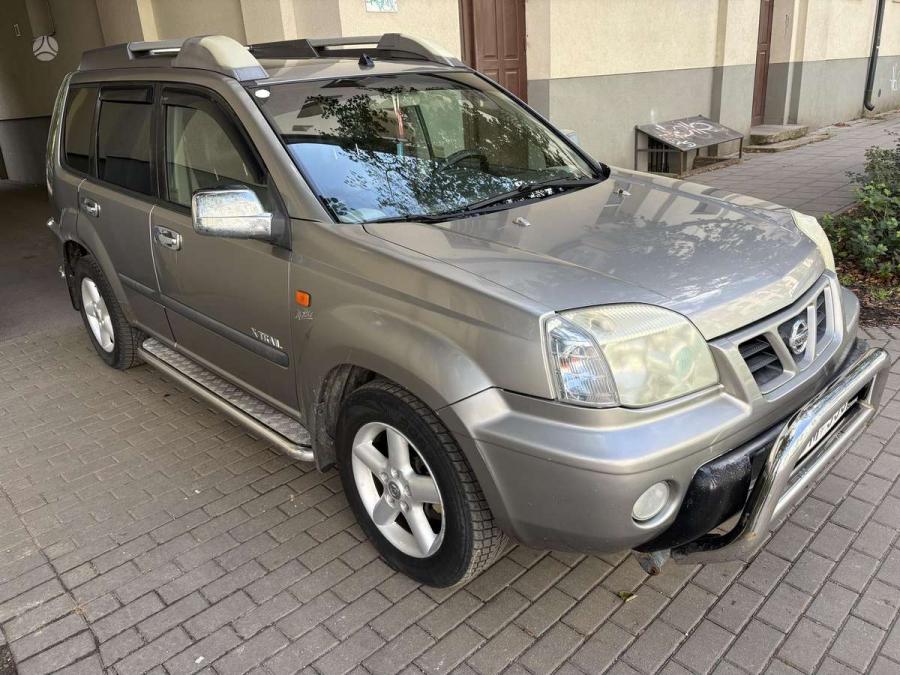 Серый Ниссан ИксТрейл 2003 в Вильнюс, объемом двигателя 2.20 л и пробегом 371 тыс. км за 1800 €, фото 4 на AUTOMOTO.COM.LV