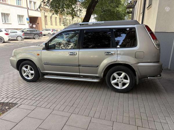 Pelēks Nissan X-Trail 2003 Viļņa, ar dzinēja tilpumu 2.20 L un nobraukumu 371 tūkst. km par 1800 €, foto 7 vietnē AUTOMOTO.COM.LV