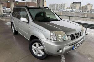 Pelēks Nissan X-Trail 2005 Viļņa, ar dzinēja tilpumu 2.20 L un nobraukumu 250 tūkst. km par 950 €, foto  vietnē AUTOMOTO.COM.LV