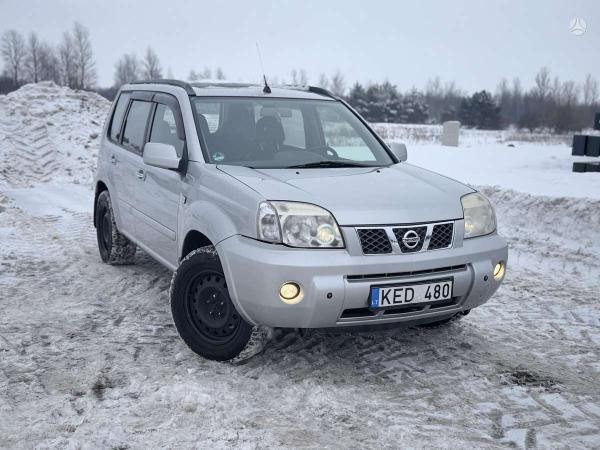 Pelēks Nissan X-Trail 2005 Viļņa, ar dzinēja tilpumu 2.18 L un nobraukumu 274 tūkst. km par 2000 €, foto 1 vietnē AUTOMOTO.COM.LV