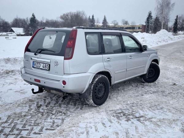 Pelēks Nissan X-Trail 2005 Viļņa, ar dzinēja tilpumu 2.18 L un nobraukumu 274 tūkst. km par 2000 €, foto 4 vietnē AUTOMOTO.COM.LV