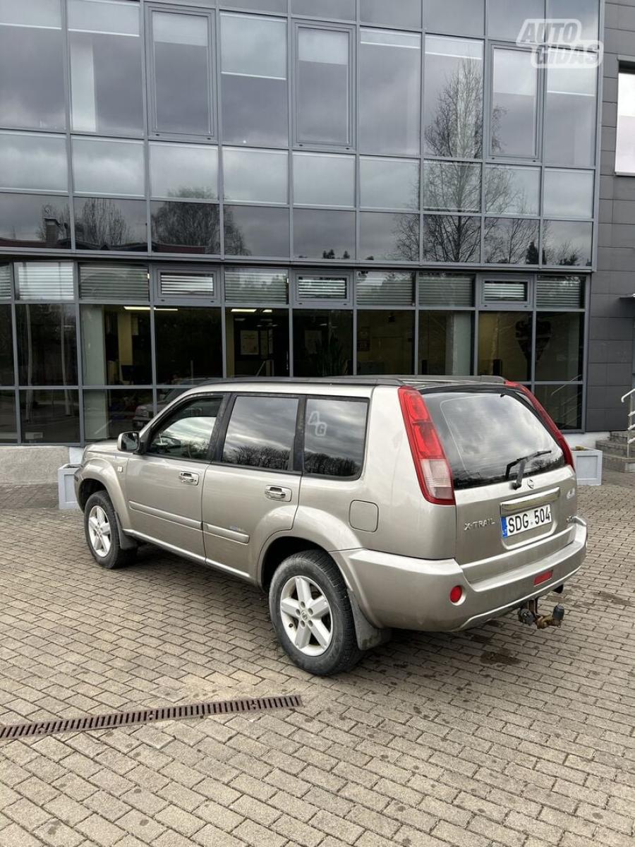 Pelēks Nissan X-Trail 2005 Klaipėda, ar dzinēja tilpumu 2.20 L un nobraukumu 369 tūkst. km par 2150 €, foto 7 vietnē AUTOMOTO.COM.LV