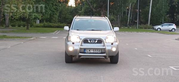 Pelēks Nissan X-Trail 2005 Rīga, ar dzinēja tilpumu 2.20 L un nobraukumu 385 tūkst. km par 1850 €, foto 1 vietnē AUTOMOTO.COM.LV