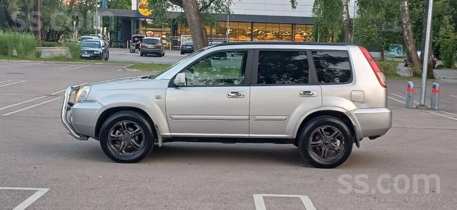 Pelēks Nissan X-Trail 2005 Rīga, ar dzinēja tilpumu 2.20 L un nobraukumu 385 tūkst. km par 1850 €, foto 5 vietnē AUTOMOTO.COM.LV