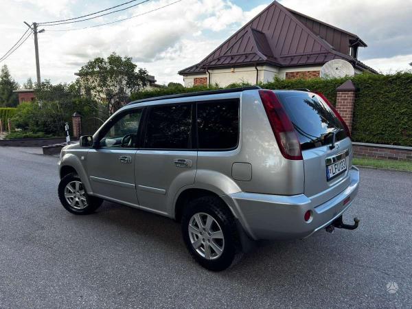 Grey Nissan X-Trail 2005 in Vilnius, with an engine capacity of 2.20 L and mileage of 230 thousand km for 1999 €, photo 7 on AUTOMOTO.COM.LV