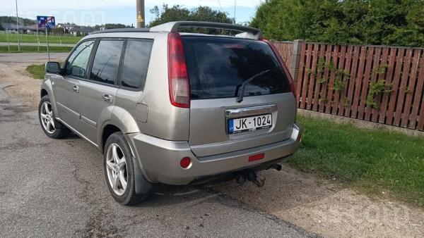 Pelēks Nissan X-Trail 2005 Rīga, ar dzinēja tilpumu 2.20 L un nobraukumu 269 tūkst. km par 2500 €, foto 4 vietnē AUTOMOTO.COM.LV
